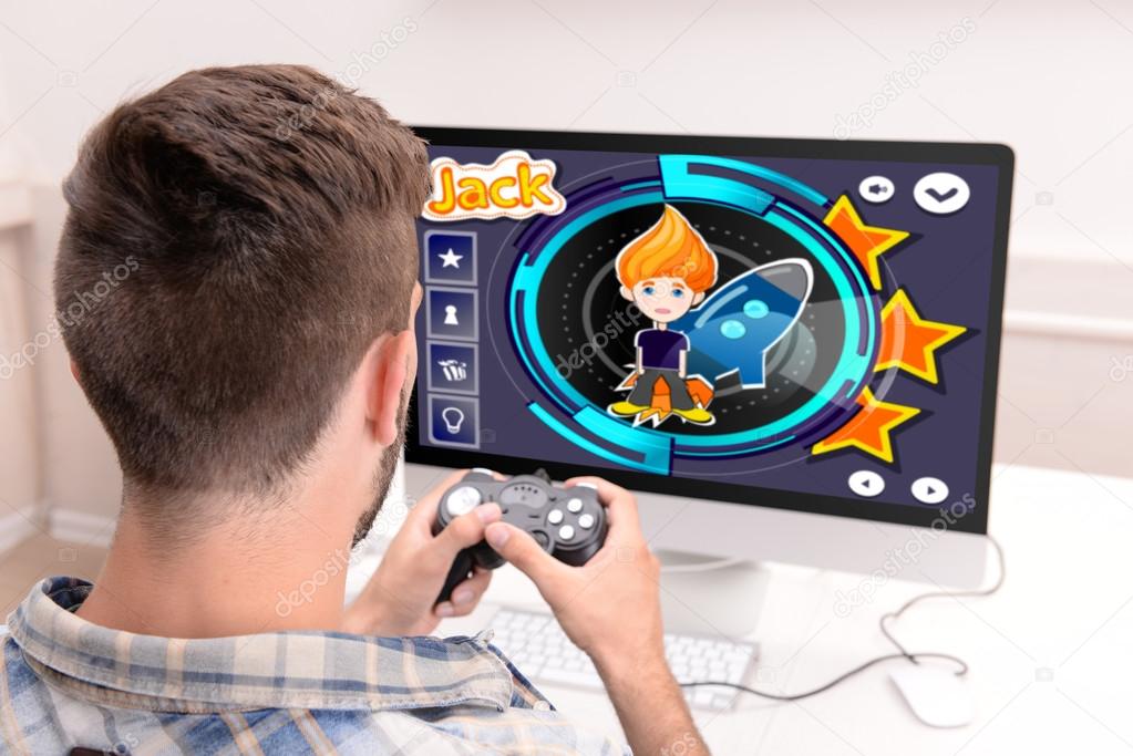 Man playing computer games — Stock Photo © belchonock #101656000