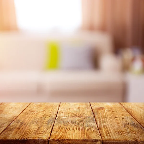 Wooden table on room background Stock Photo by ©belchonock 25411513
