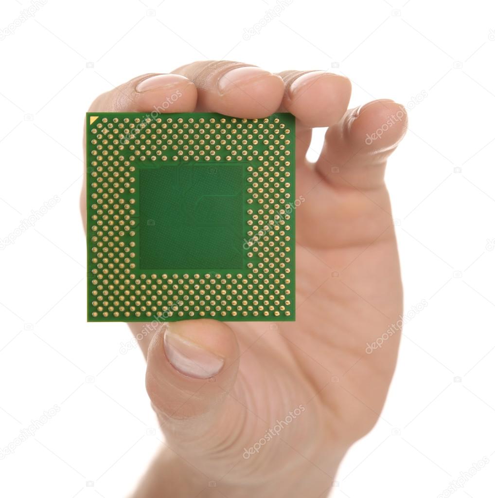 Hand holding microprocessor Stock Photo by ©belchonock 102143576