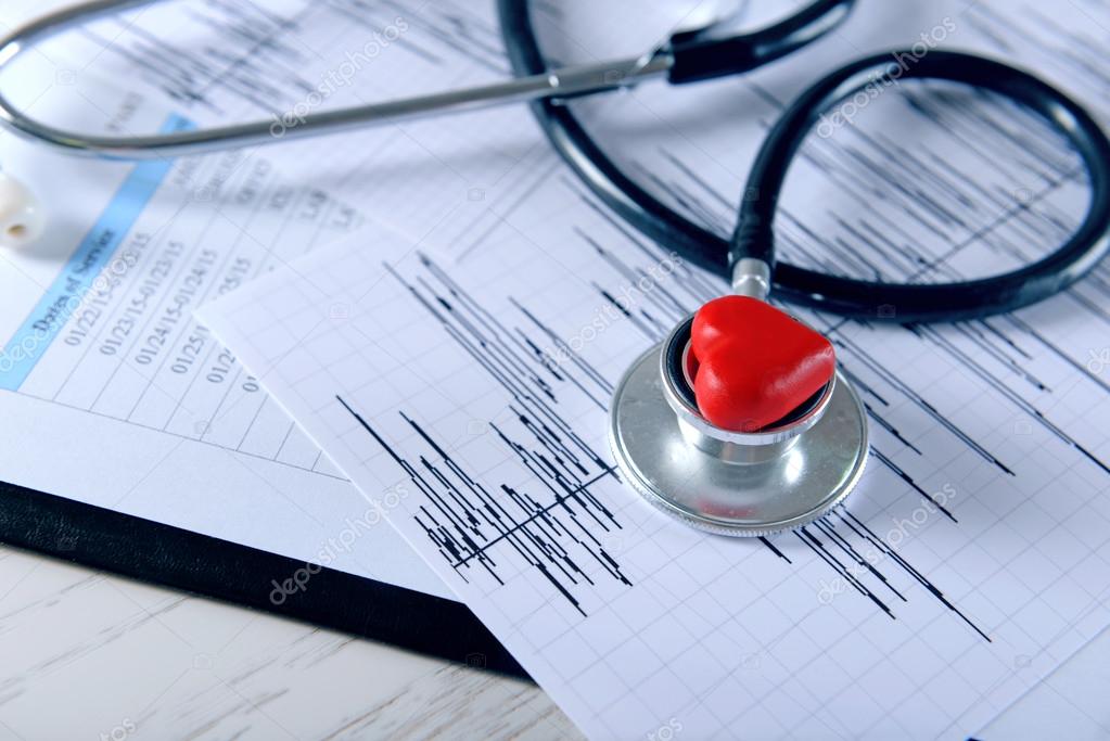 Cardiogram chart with medical stethoscope — Stock Photo © belchonock ...