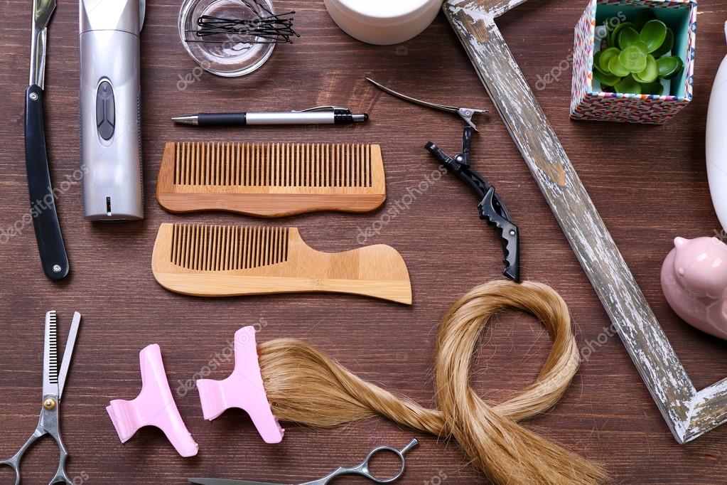Frame with strand of hair, barber tools Stock Photo by ©belchonock ...