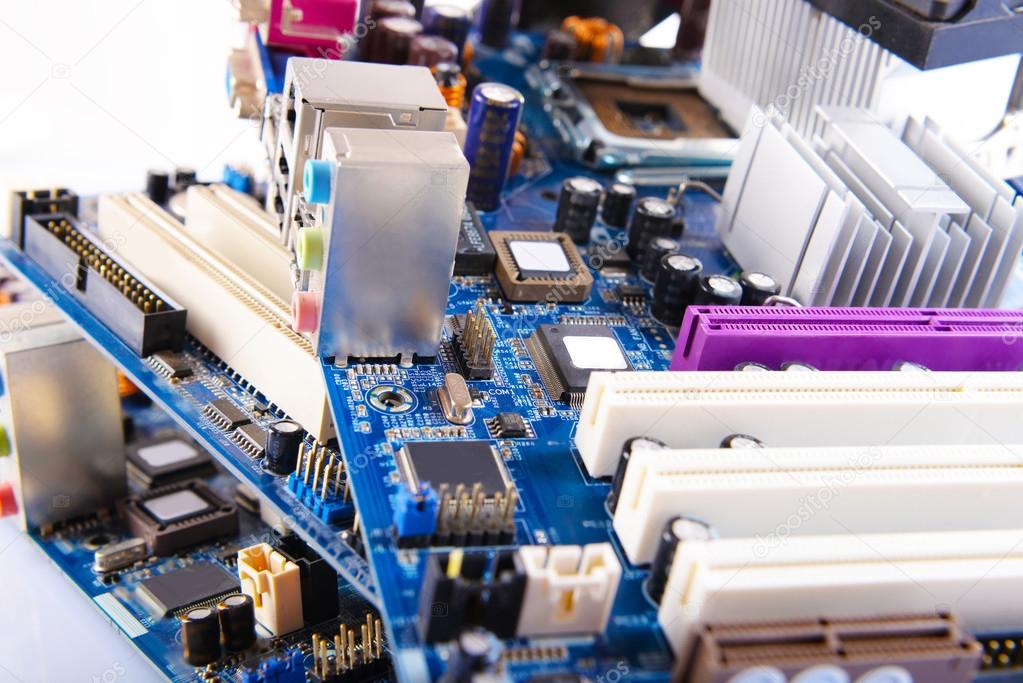 Computer motherboards close up — Stock Photo © belchonock #103753188