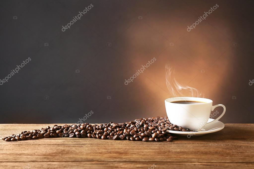 Cup of coffee on table — Stock Photo © belchonock #106677522
