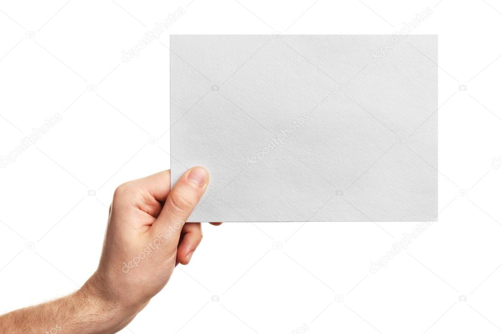 Male hand holding clean sheet of paper — Stock Photo © belchonock ...