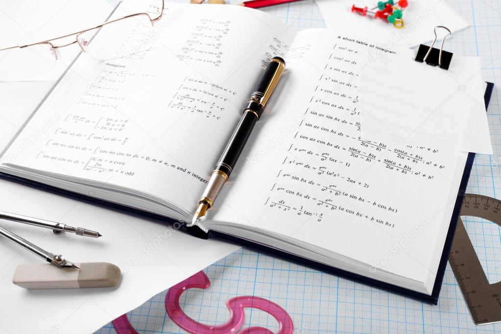 School supplies and textbook — Stock Photo © belchonock #108212256