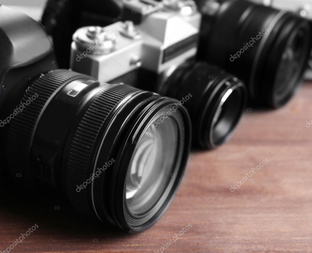 Modern and retro cameras Stock Photo by ©belchonock 108390902