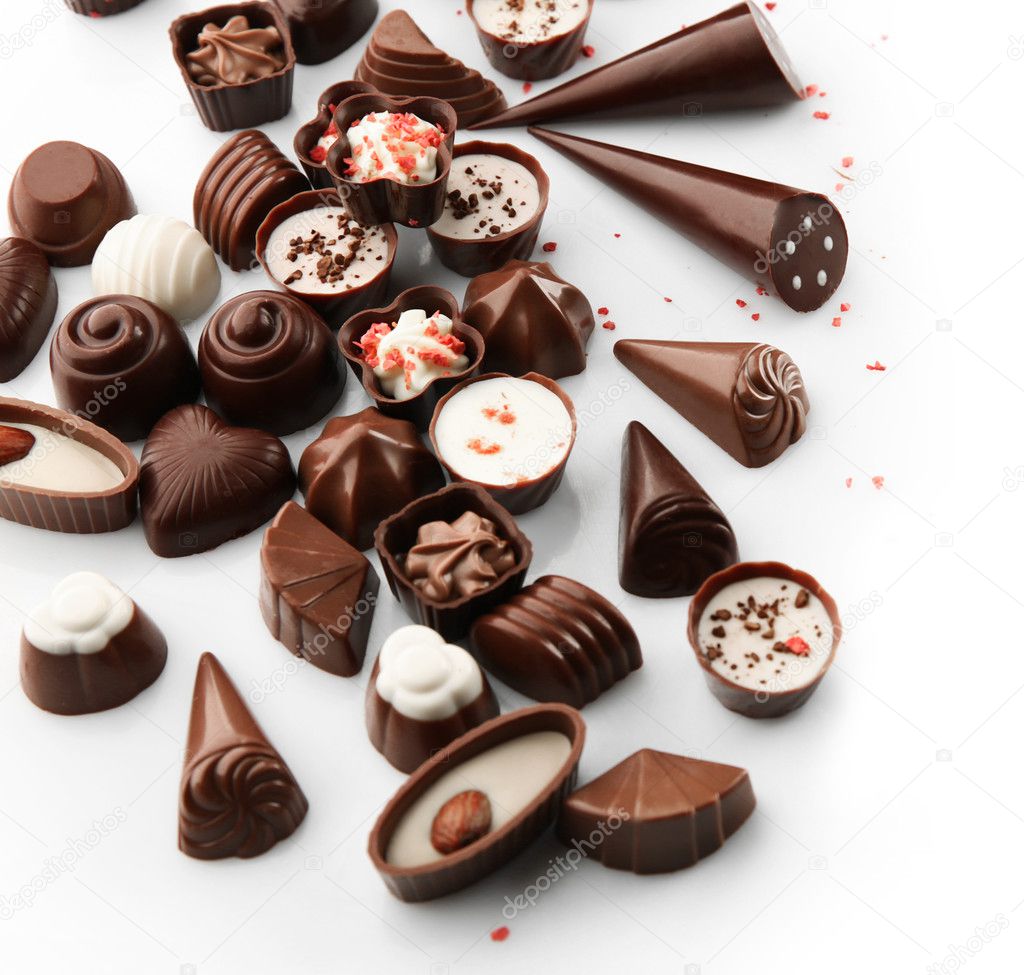 Assorted chocolate candies, isolated on white Stock Photo by ...