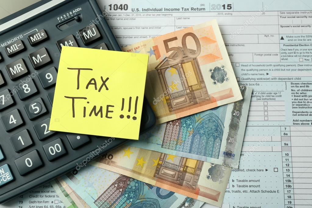 Black calculator with cash — Stock Photo © belchonock #109712888