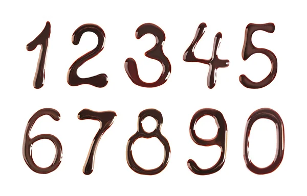 Chocolate numbers on white background Stock Photo by ©belchonock 124778356