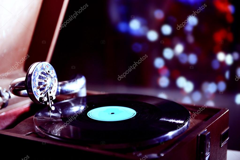Turntable with vinyl record Stock Photo by ©belchonock 110559166
