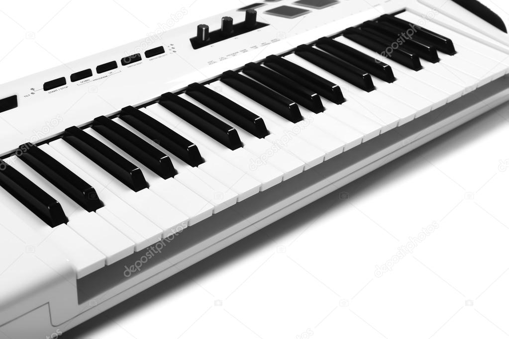 Keyboard of synthesizer closeup — Stock Photo © belchonock #111461488