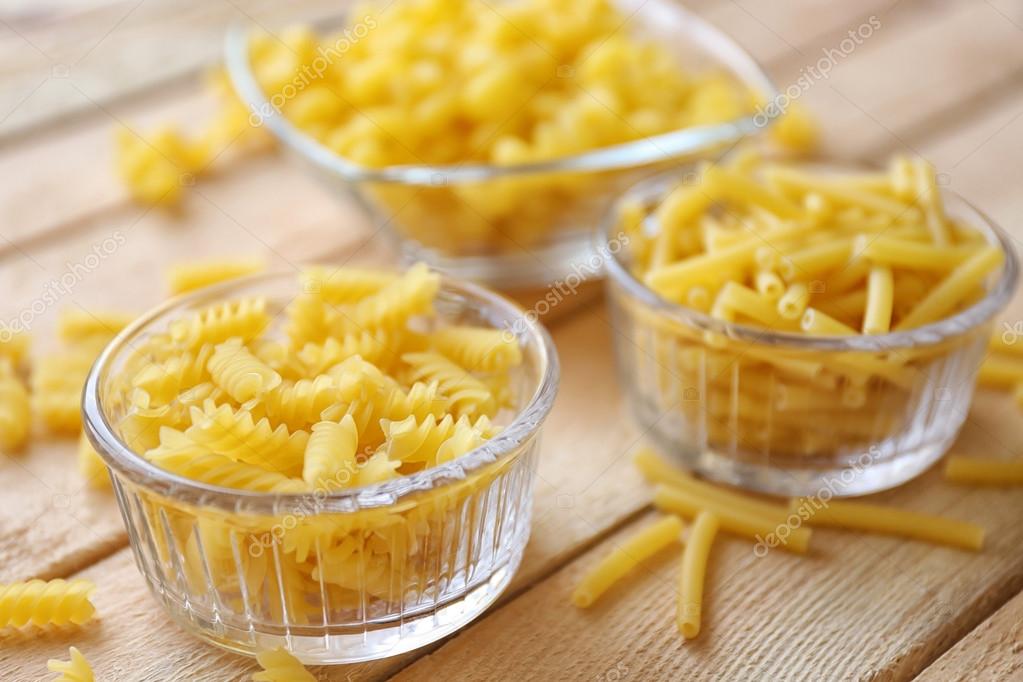 Pasta in glass bowl Stock Photo by ©belchonock 111835670