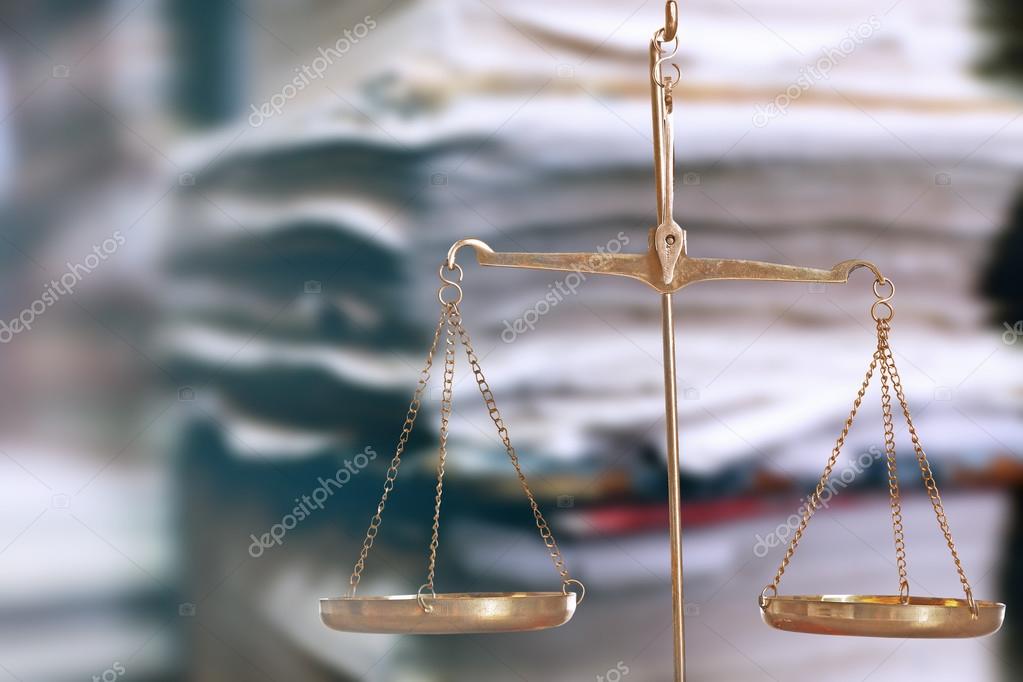 Justice scales on in library — Stock Photo © belchonock #111850568