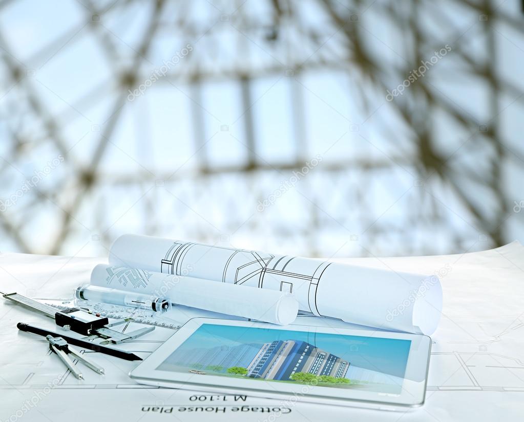 Table with construction drawings — Stock Photo © belchonock #112219486