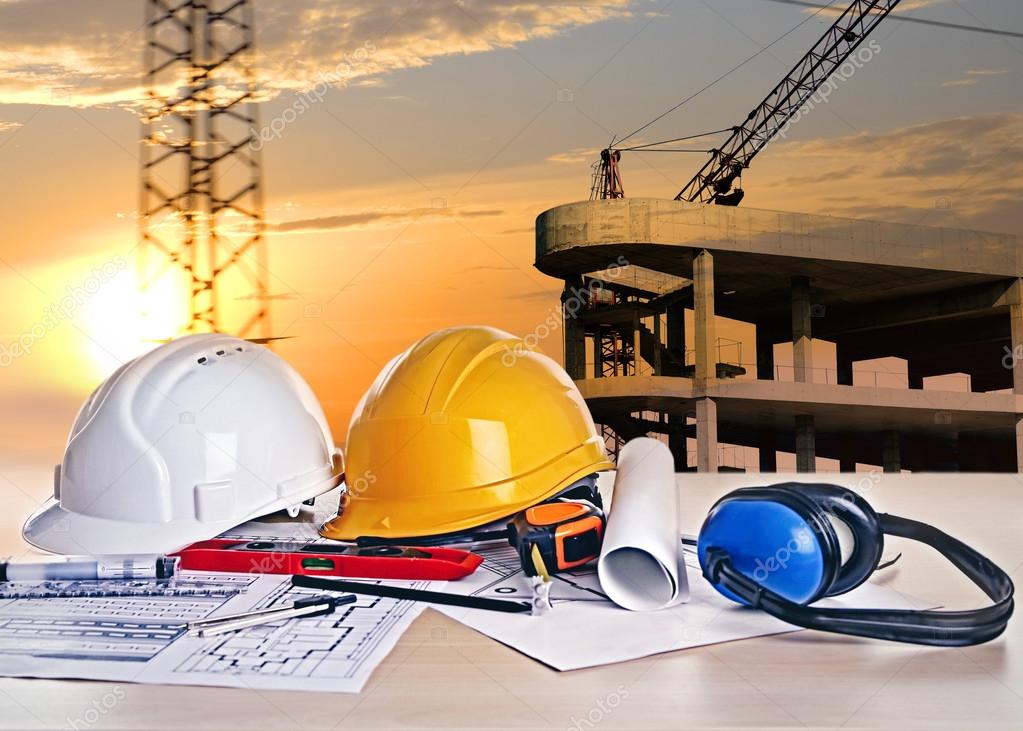 Table with construction drawings Stock Photo by ©belchonock 112220010
