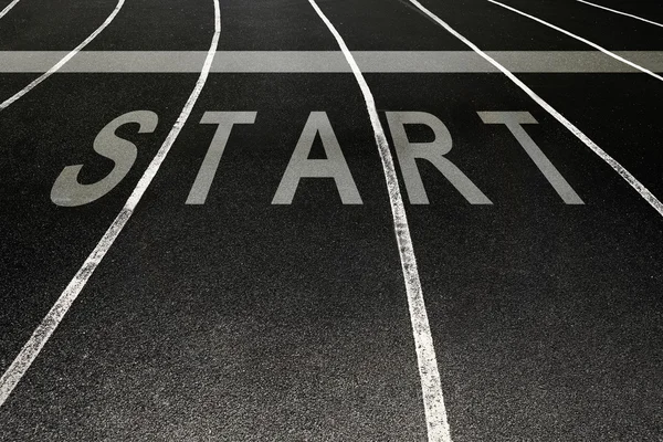 Start written on running track Stock Photo by ©belchonock 113523238