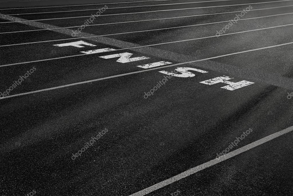 Finish written on running track Stock Photo by ©belchonock 113523192