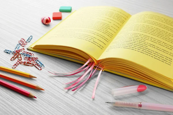 Books and pens on a table Stock Photos, Royalty Free Books and pens on ...