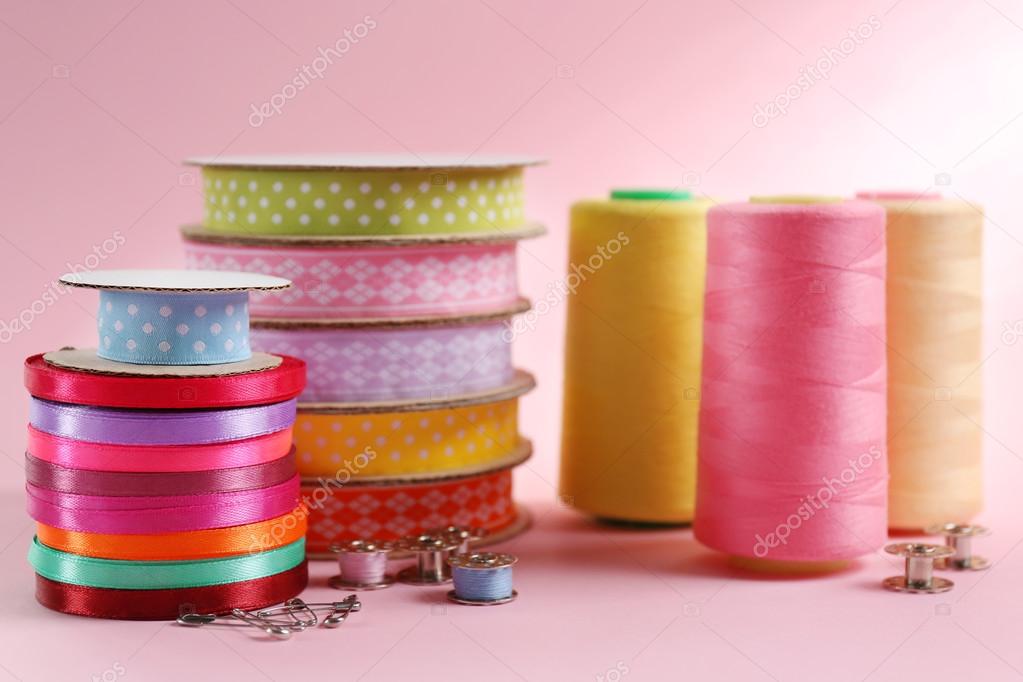 Many ribbons and sewing accessories Stock Photo by ©belchonock 113558078