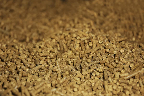 Solid wooden pellets Stock Photo by ©belchonock 114149786