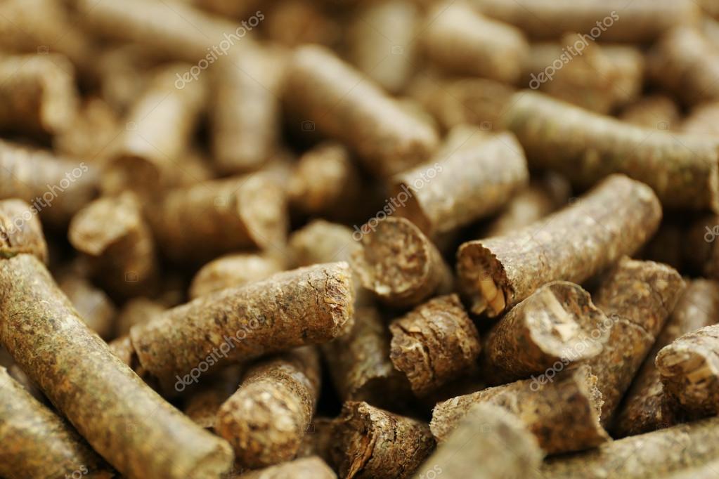 Solid wooden pellets Stock Photo by ©belchonock 114149786