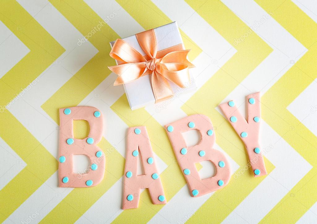Word "Baby" on background Stock Illustration by ©belchonock #114369488