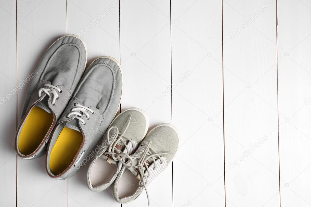Big and small shoes Stock Photo by ©belchonock 116576416