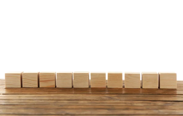 Seven blank wooden blocks Stock Photo by ©Gajus-Images 44273833