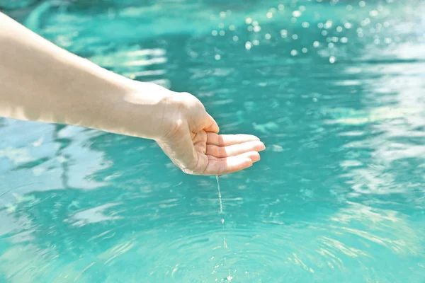 Hand Cupping Dripping Water