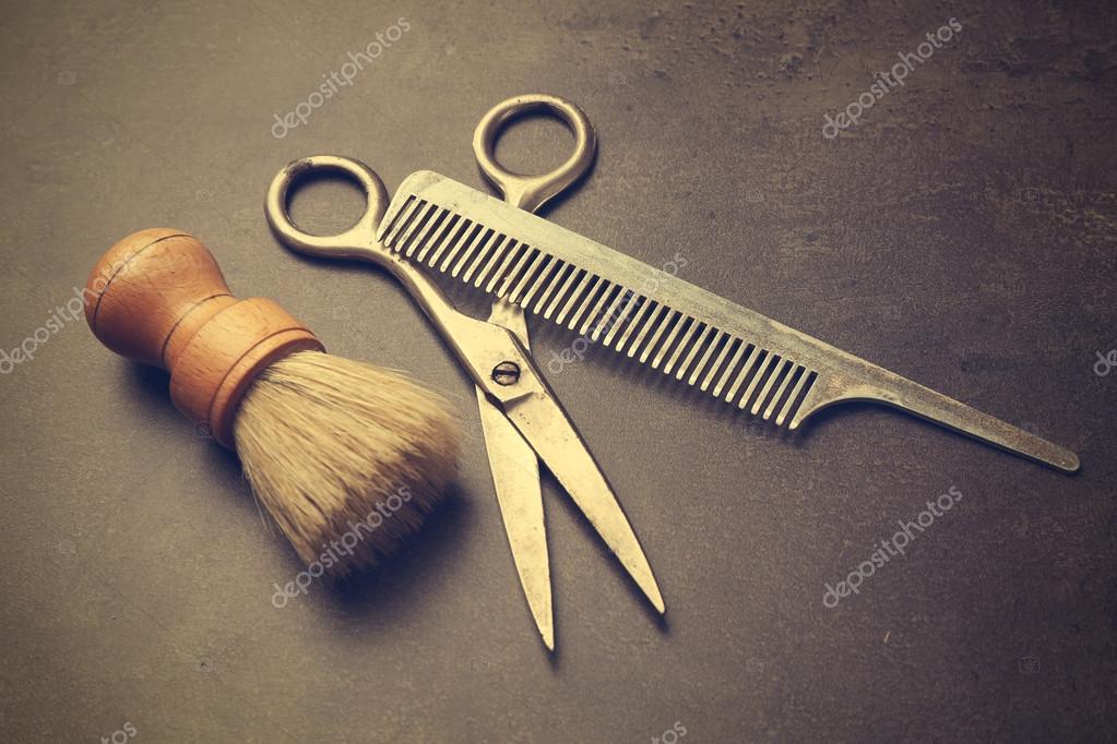 Vintage tools of barber shop Stock Photo by ©belchonock 118581482