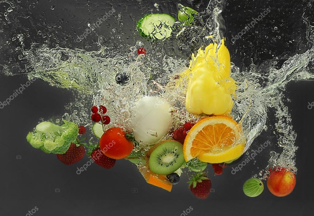 Vegetables and fruits falling into water Stock Photo by ©belchonock ...