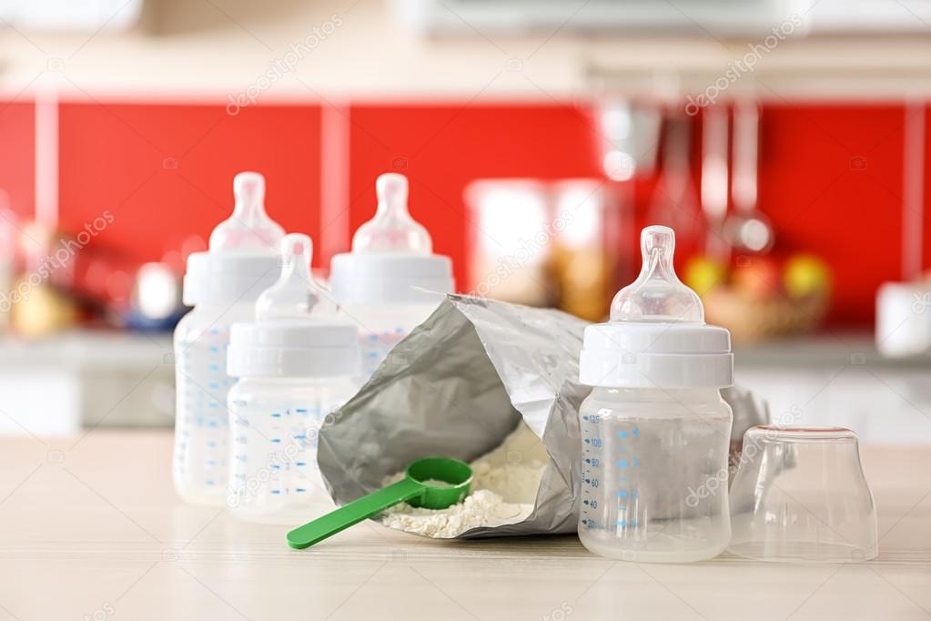 Baby milk formula Stock Photo by ©belchonock 120437022