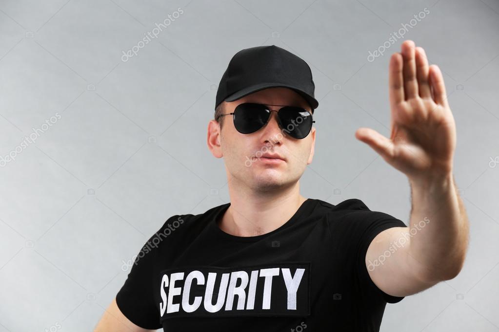 Male security guard Stock Photo by ©belchonock 123703070