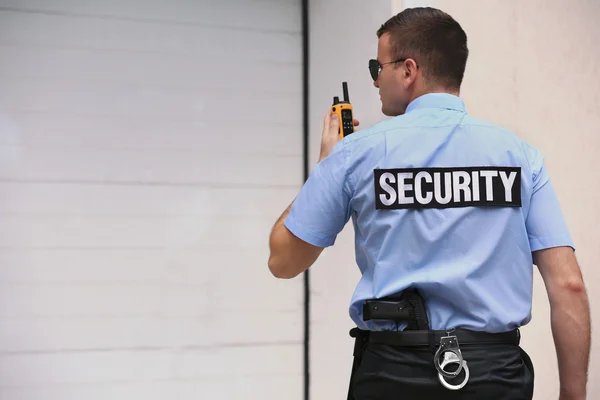 Male security guard ⬇ Stock Photo, Image by © belchonock #123703066