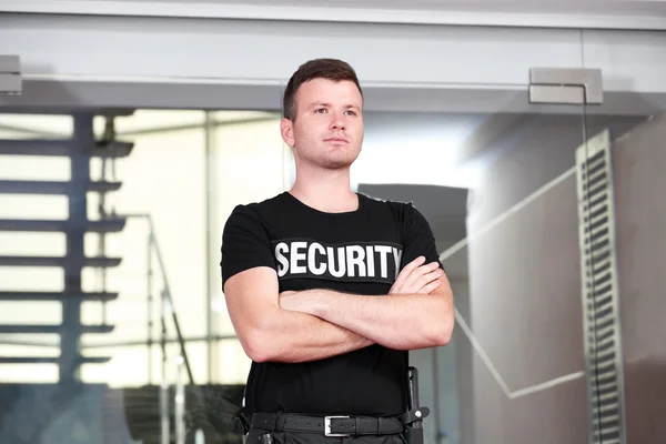 Male security guard ⬇ Stock Photo, Image by © belchonock #123703066