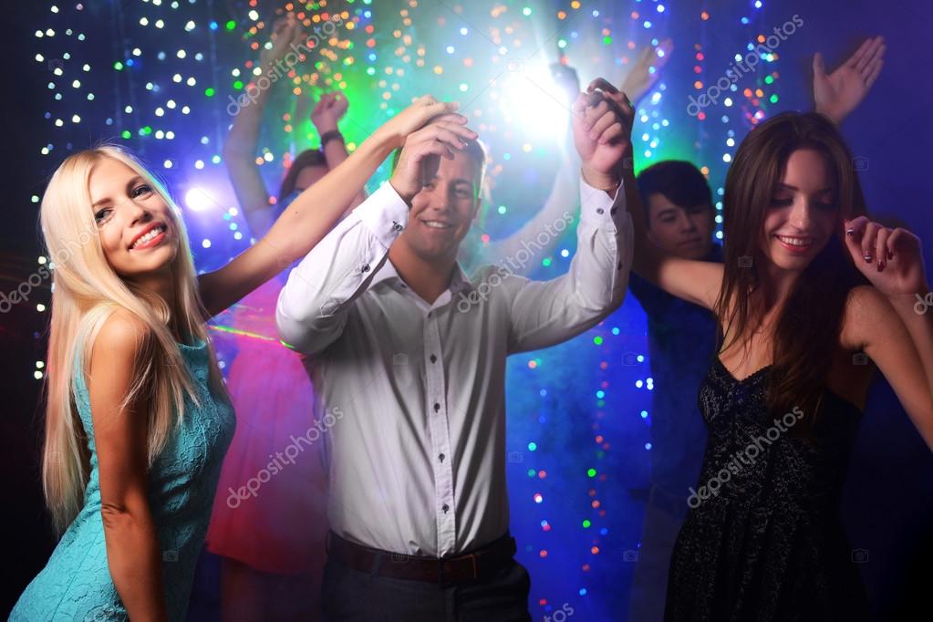 People dancing at party Stock Photo by ©belchonock 55325657
