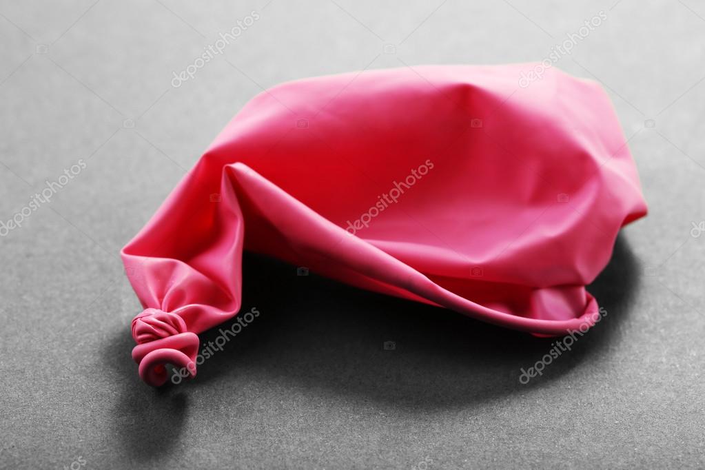 Popped pink balloon Stock Photo by ©belchonock 55735541