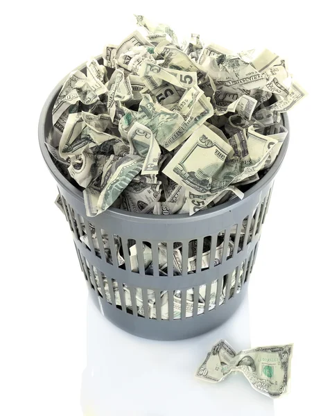 Money in trash can, isolated on white Stock Photo by ©belchonock 34636157