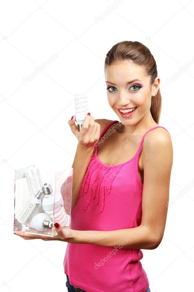 Young girl sorting lamps isolated on white — Stock Photo © belchonock ...