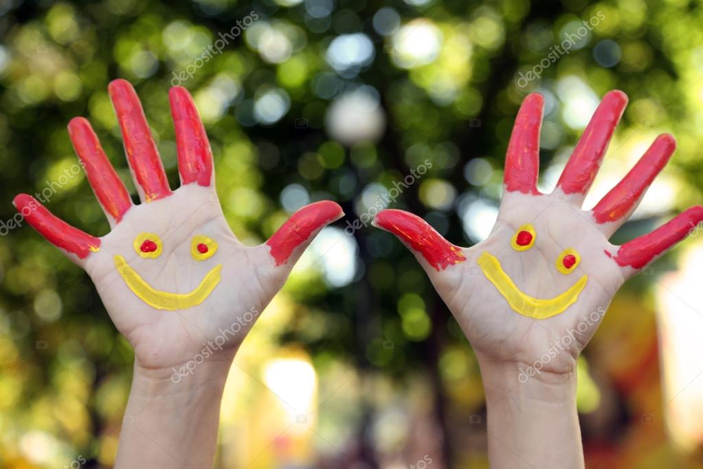 Smiling colorful hands — Stock Photo © belchonock #56385875