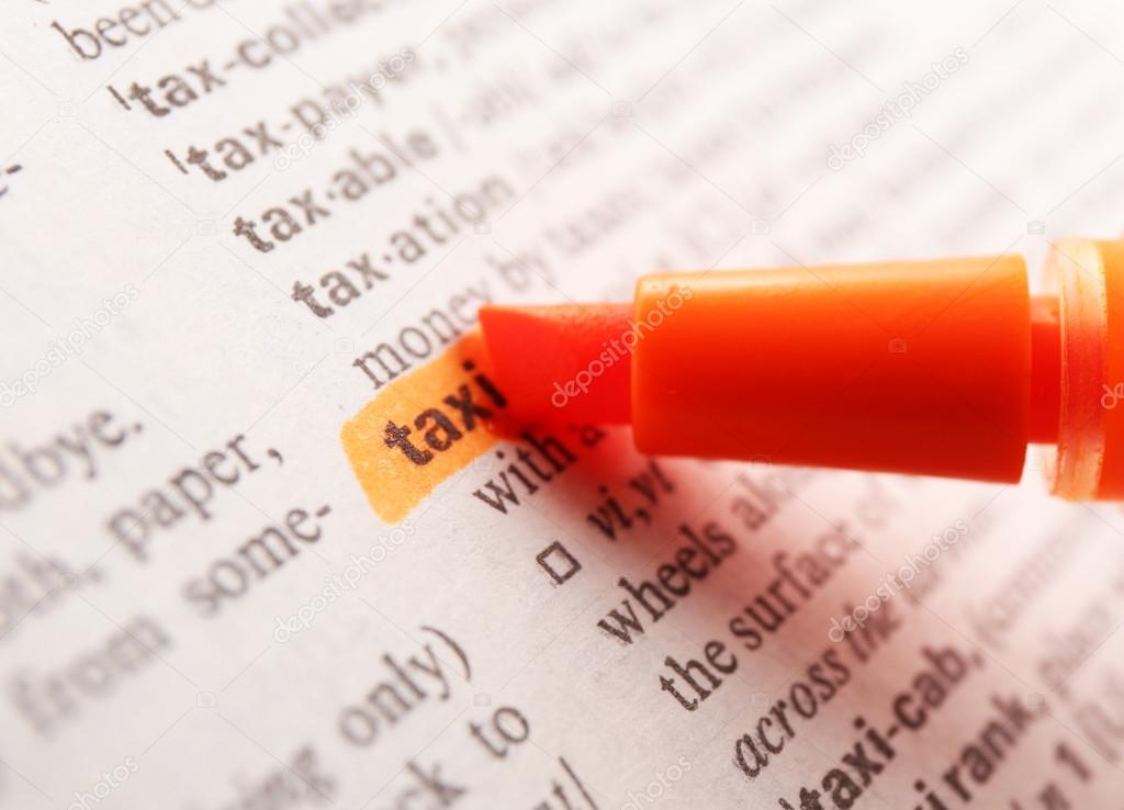 Marker highlighting word in dictionary Stock Photo by ©belchonock 56595037