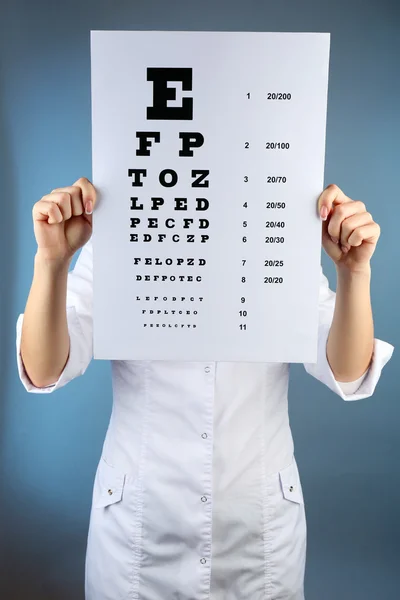 Woman with eye chart - Stock Image - Everypixel