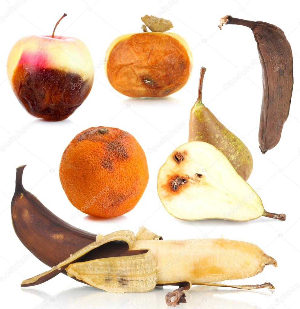 Rotten fruits isolated on white — Stock Photo © belchonock #60829157