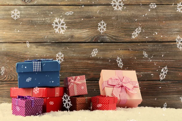 Wooden rustic background with red christmas presents. — Stock Photo ...