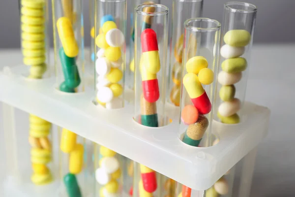 Drugs in test tubes Stock Photo by ©belchonock 57620135