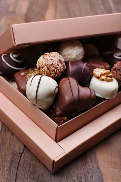Box filled with chocolates Stock Photo by ©belchonock 60872383