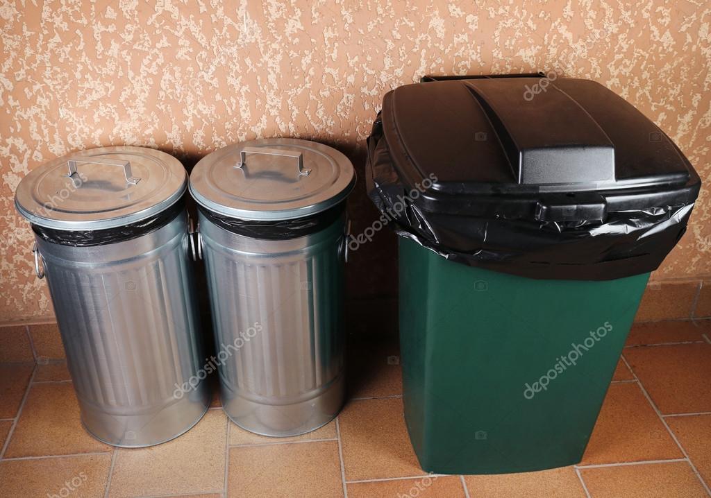 Recycling bins on wall background — Stock Photo © belchonock #62834281