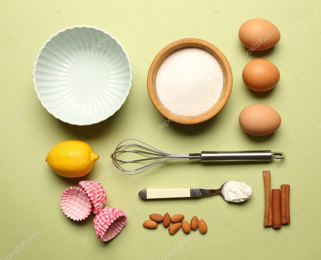 Food ingredients and kitchen utensils for cooking on green background ...