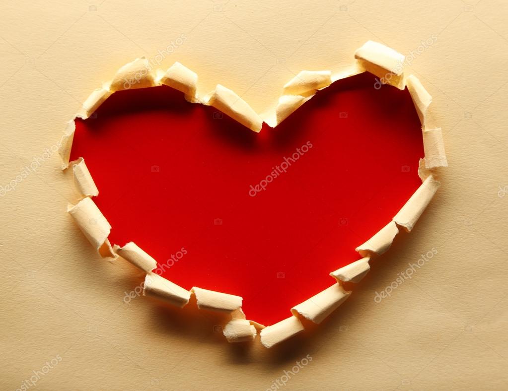 Torn paper heart Stock Photo by ©belchonock 63218939