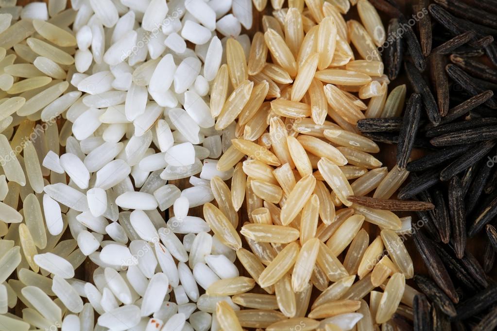 Different types of rice close up — Stock Photo © belchonock #64549001